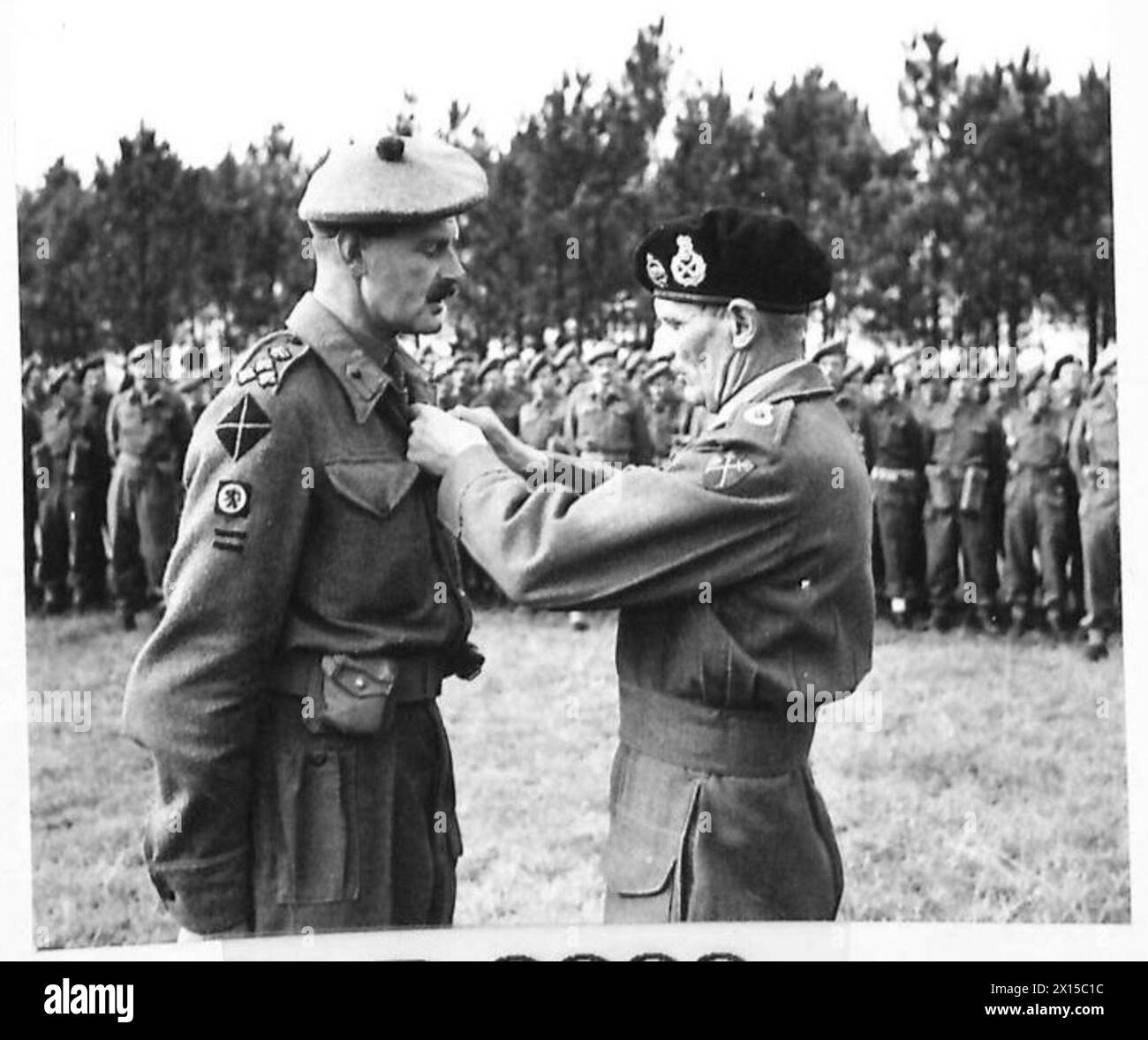 Brigadier R.M. Villiers, commanding 46th Infantry Brigade, receives the ...