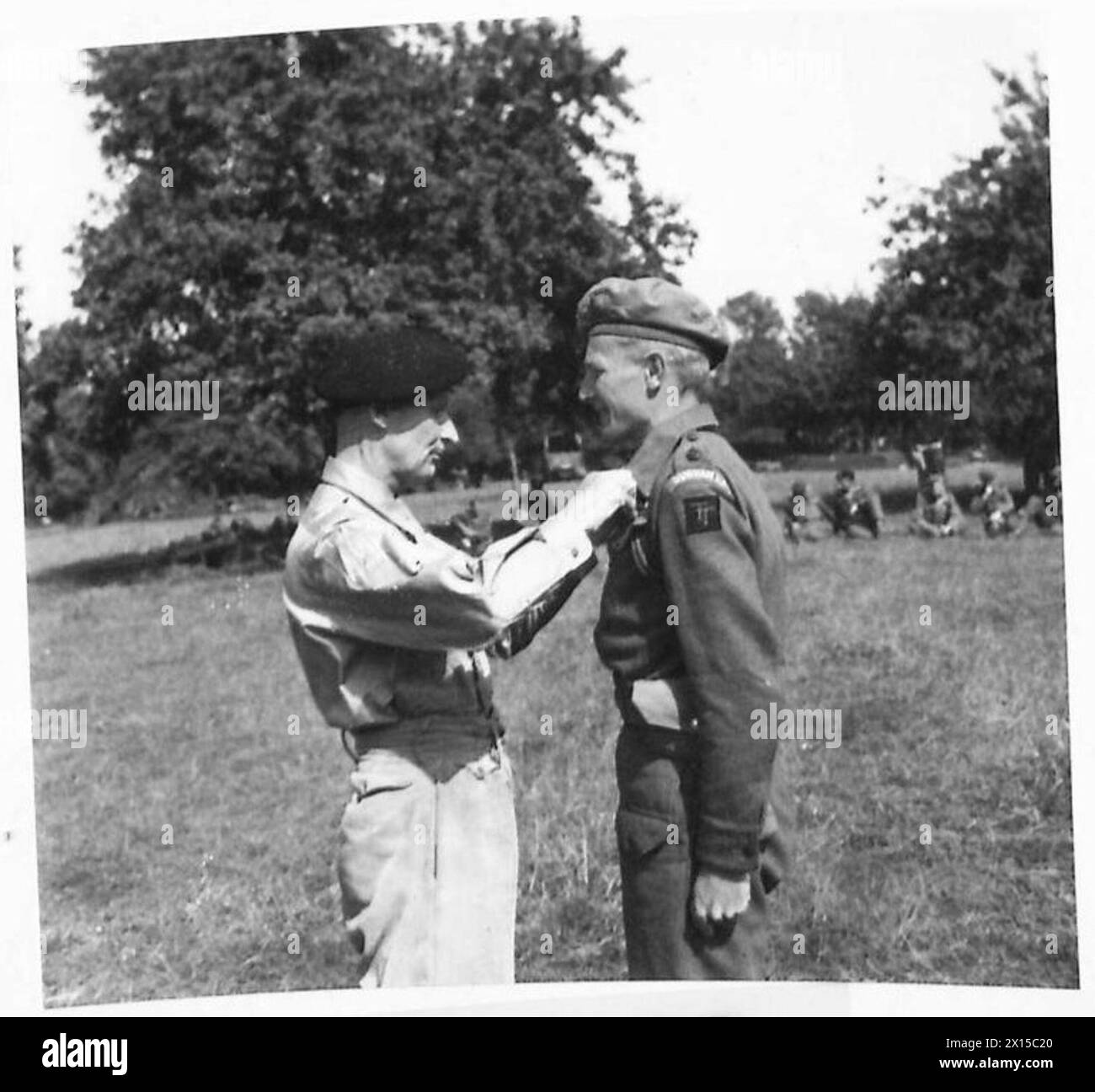 General Montgomery decorates Major J.H. Atkinson of the 50th Division ...