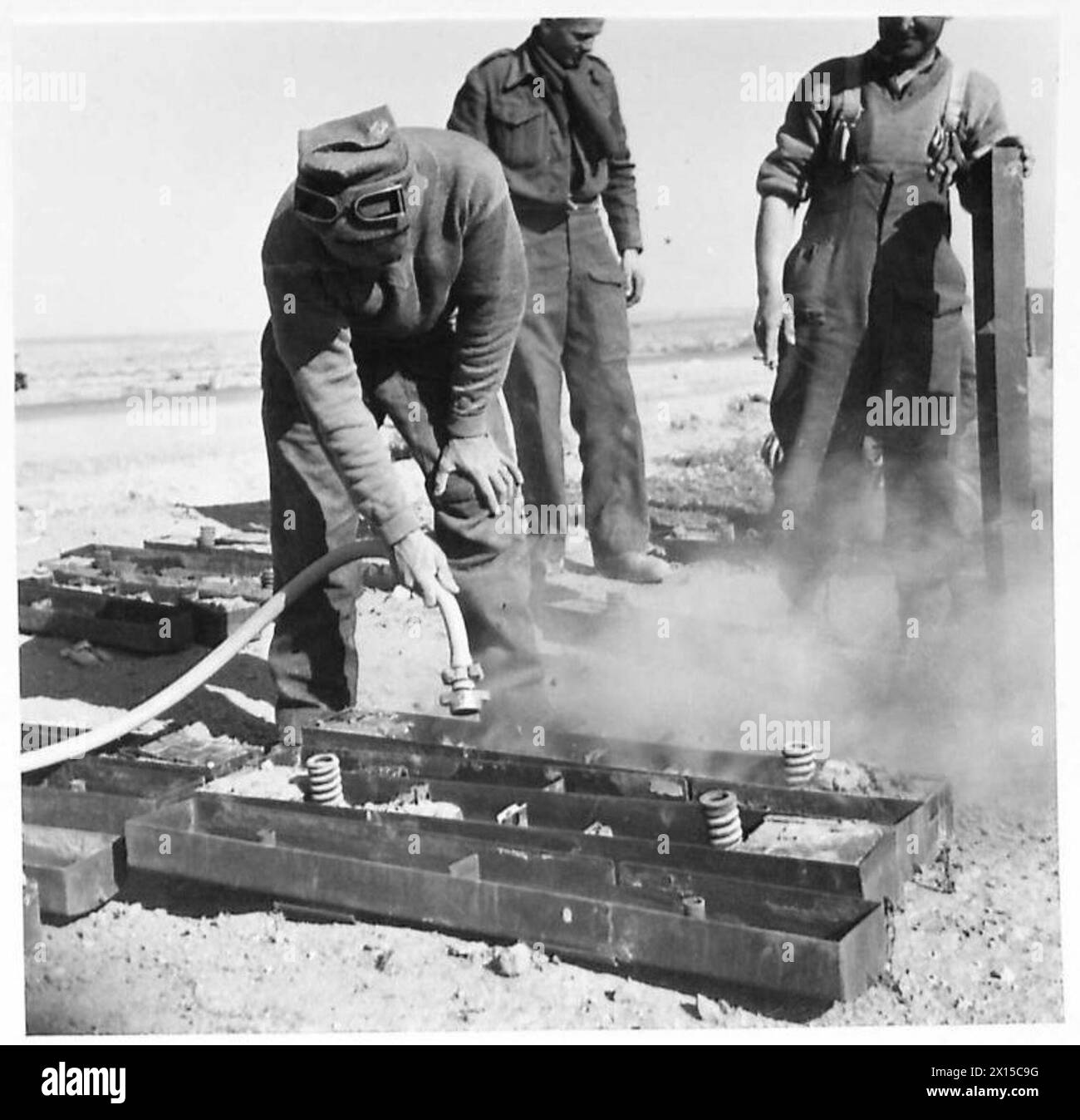 Italian land mines in the Western Desert are cleared using compressed ...