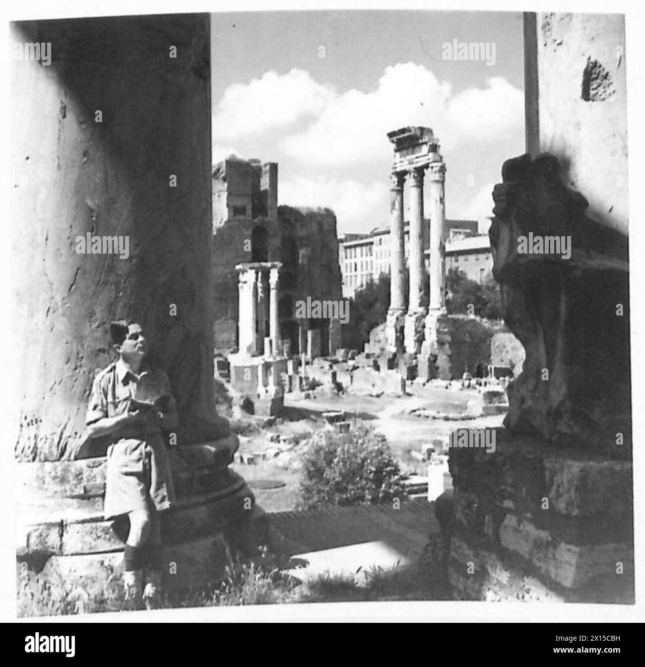 A DAY IN ROME WITH GUNNER SMITH - "Gnr. Smith" examines the remains of ...