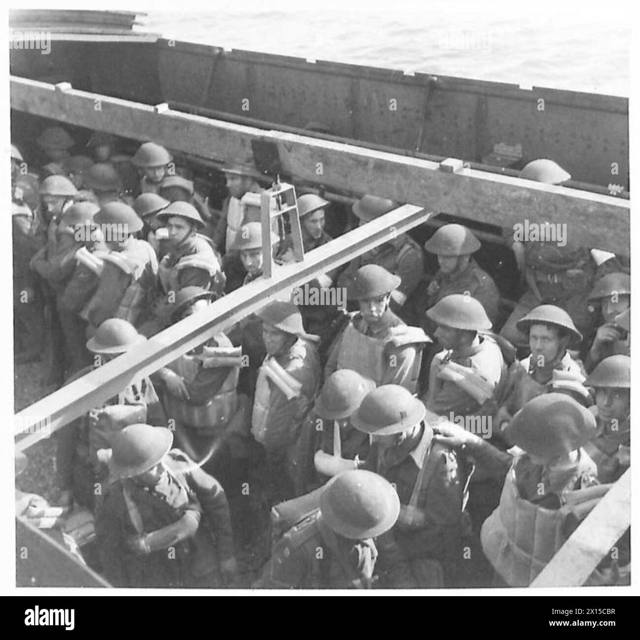 COMBINED OPERATIONS EXERCISE - Troops leave the destroyer and climb ...