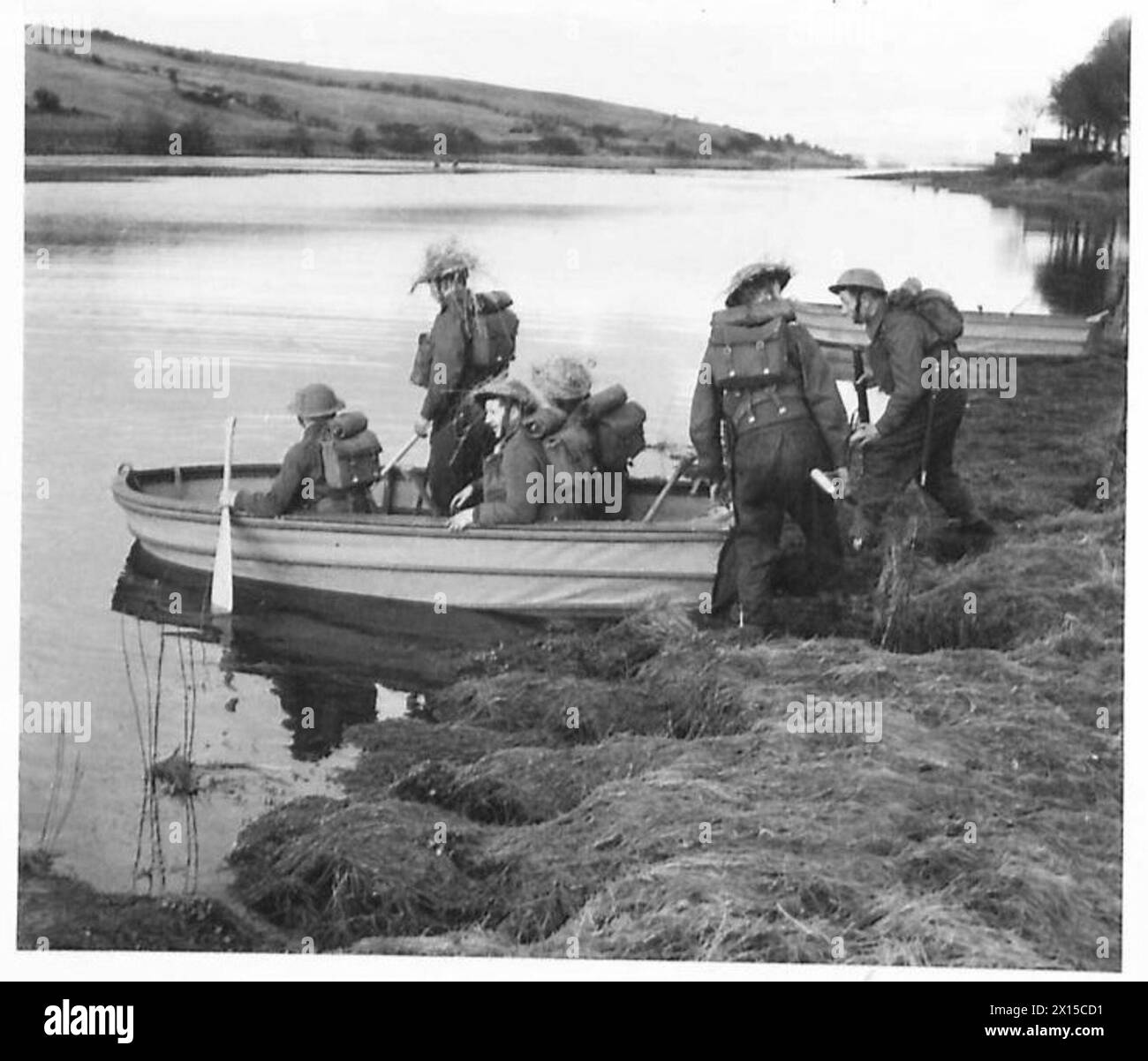 DOMESTIC EFFICIENCY FIRST - Troops crossing a river in collapsible ...
