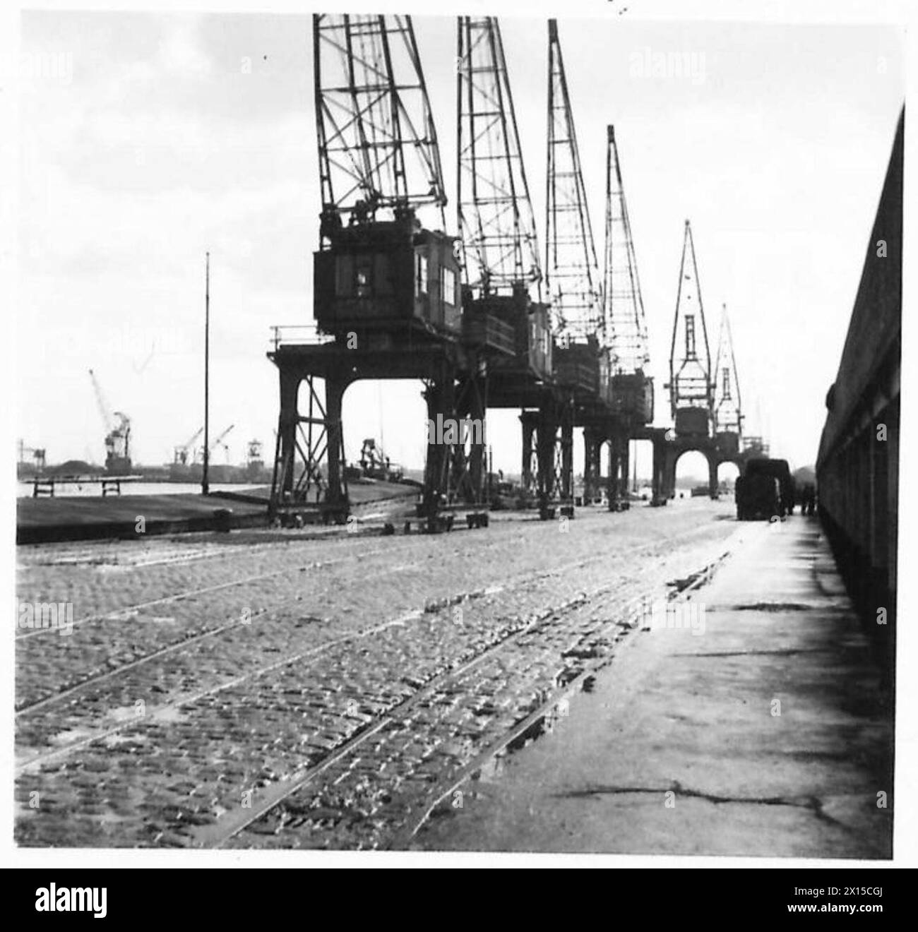 THE PORT OF ANTWERP, BELGIUM - Giant cranes that will soon lift Allied ...