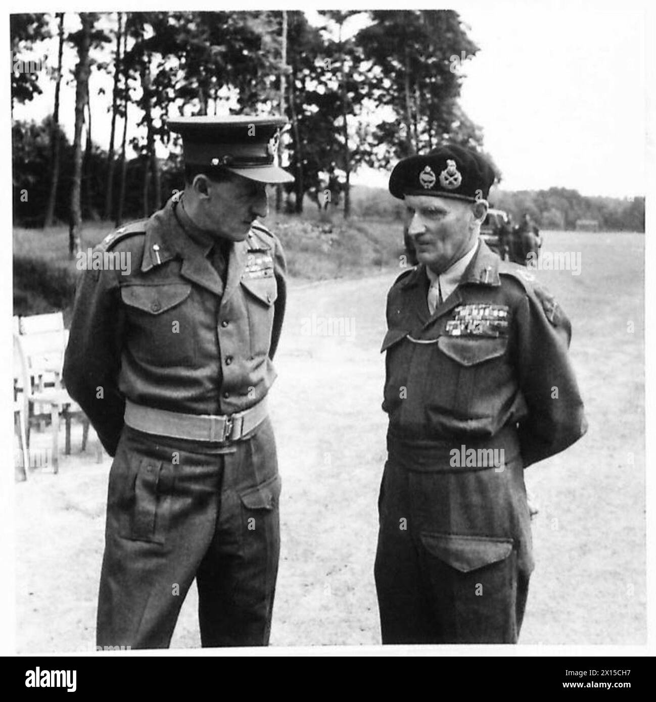 Field Marshal Montgomery talks with Major General R.K. Ross, reviewing ...