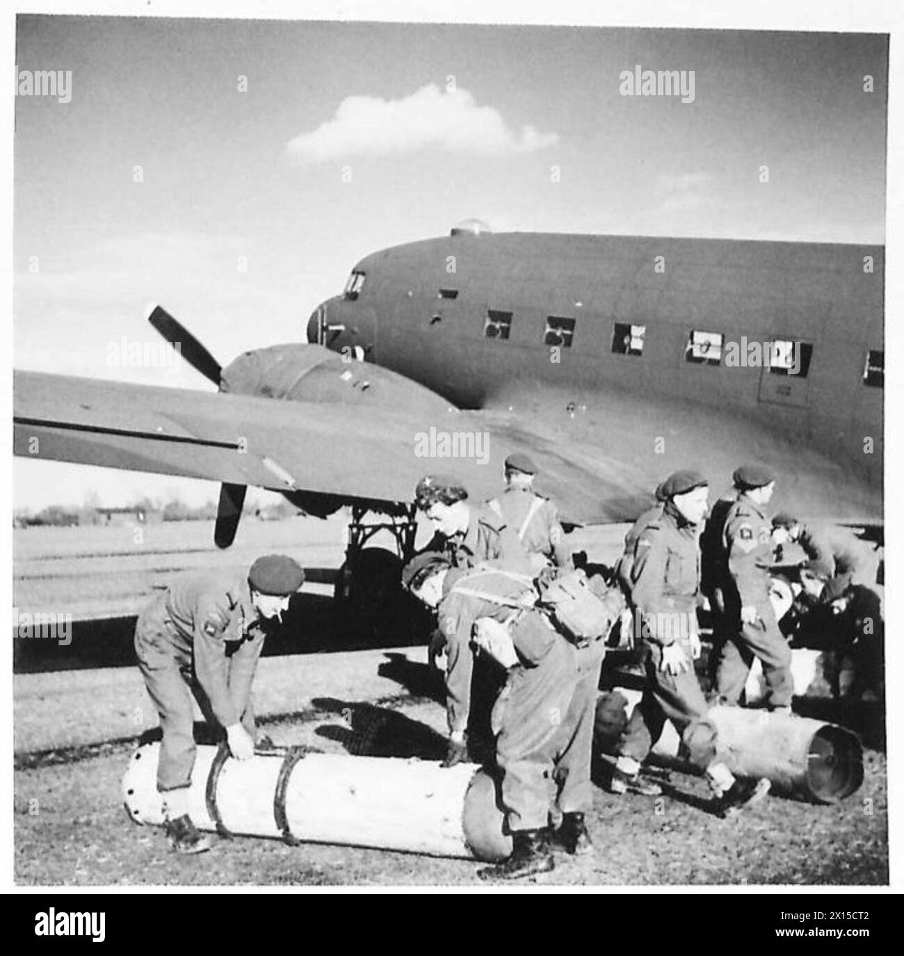 BIG AIRBORNE EXERCISE - Unloading containers from a Dakota prior to ...