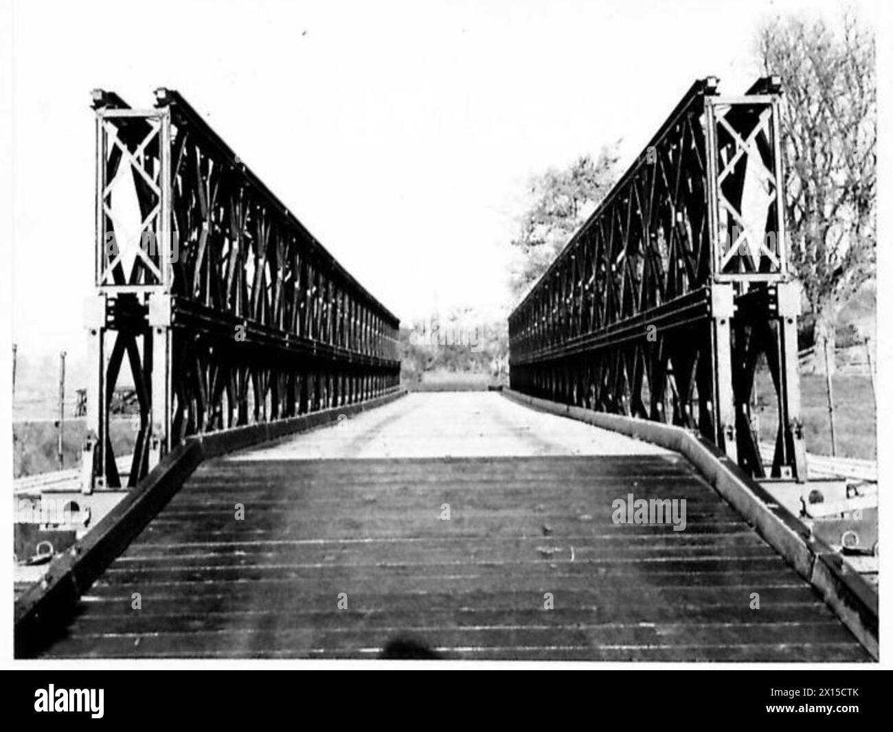 The approach to a Bailey Bridge is constructed and prepared for ...