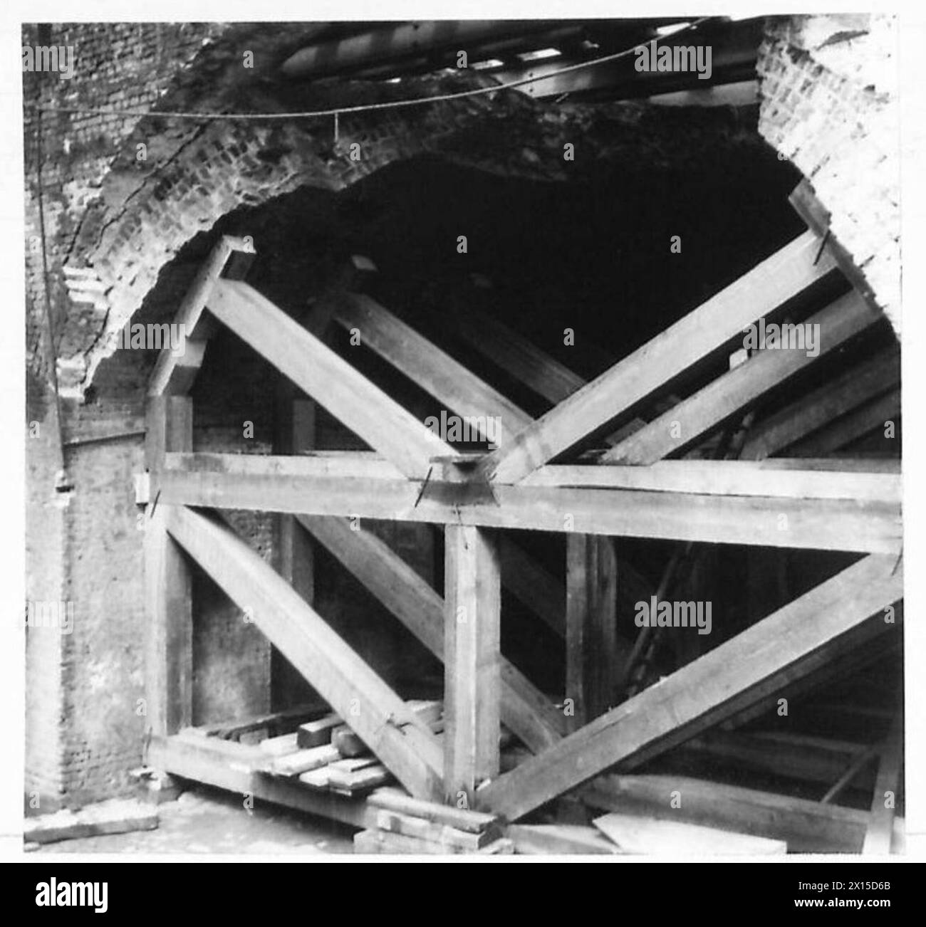 Royal Engineers repair a brick arch railway bridge carrying the ...