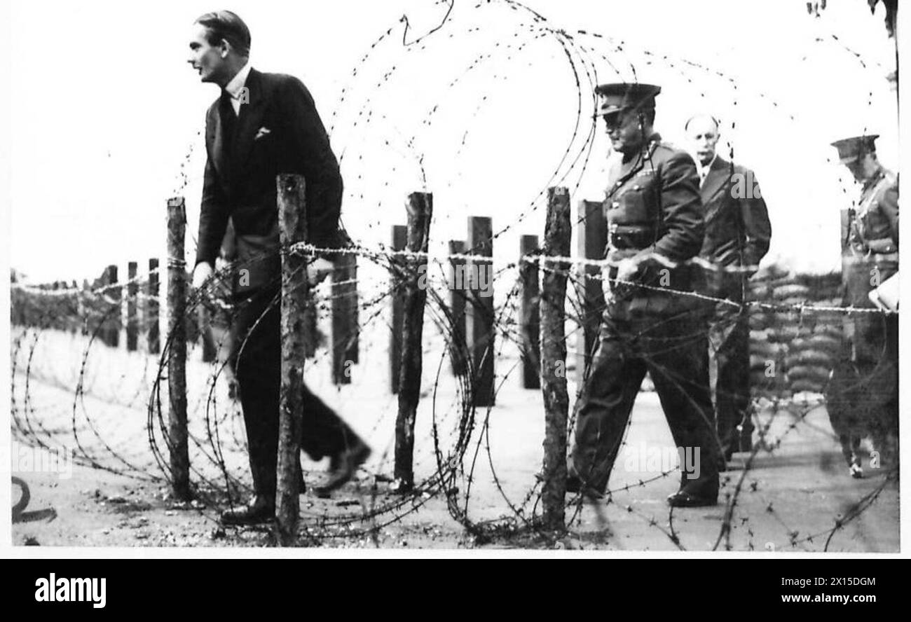 SECRETARY OF STATE VISIT COASTAL DEFENCES - Mr. A. Eden passing through ...