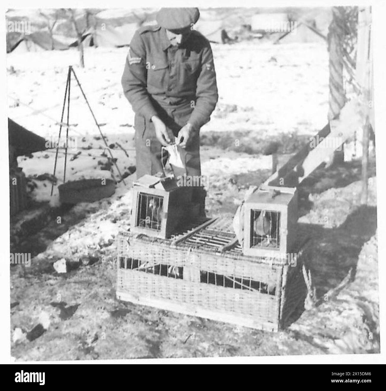 FIFTH ARMY : WINGED MESSENGERS - Cpl. Jones filling the small bag which ...