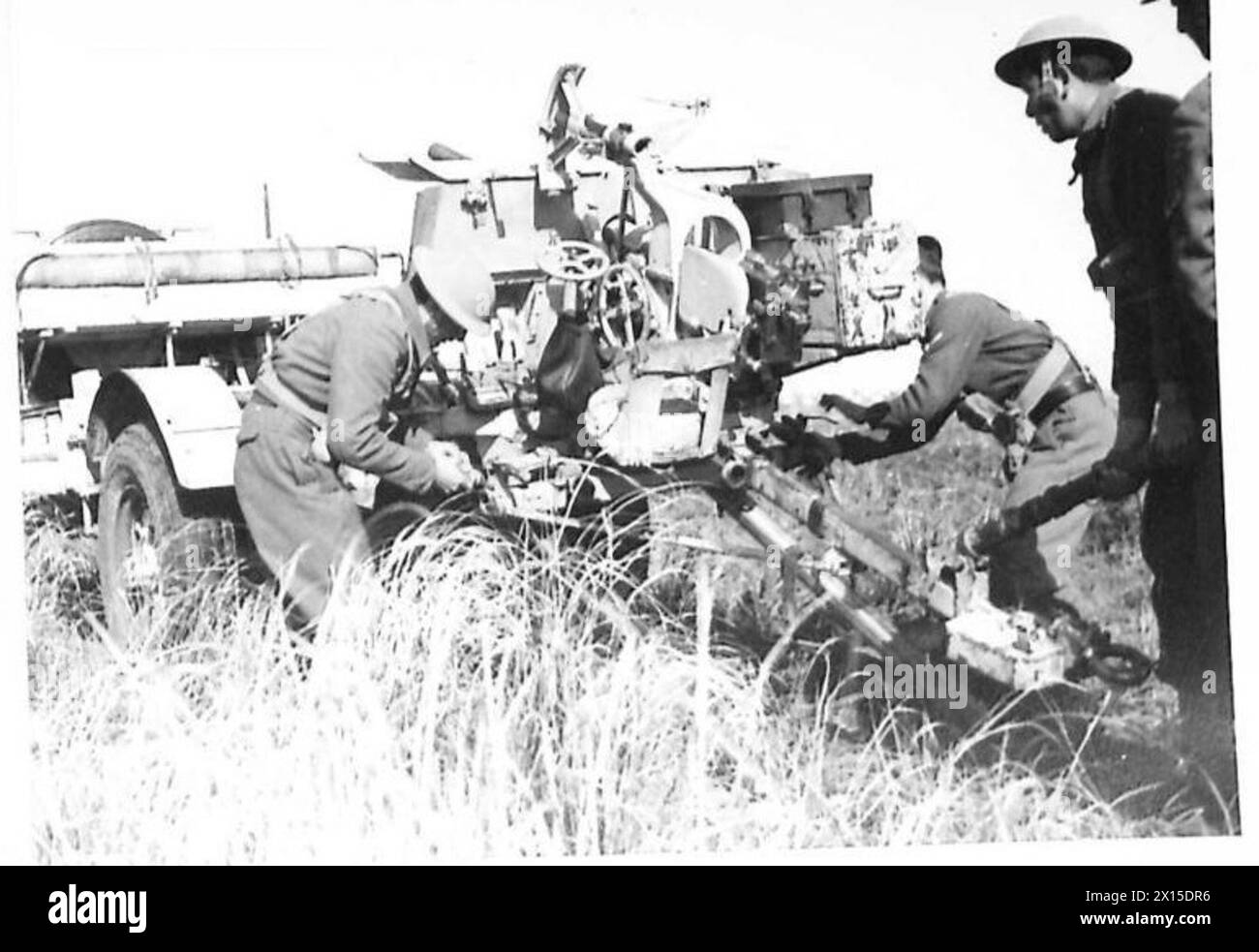 A GREEK ARMY IN TRAINING - Greek troops unloading an anti-tank gun from ...