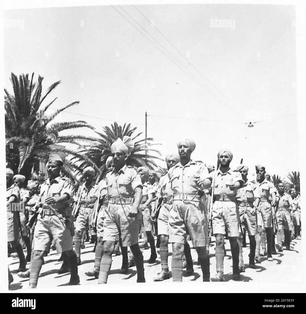 Ghurkas of the 4th Indian Division participate in a victory parade in ...