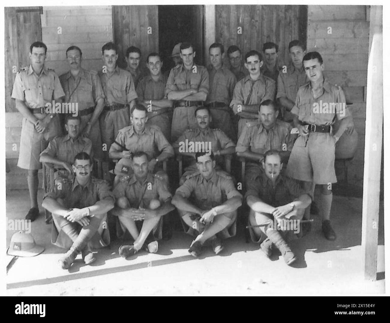 The Commanding Officer and officers are pictured outside the Mess ...