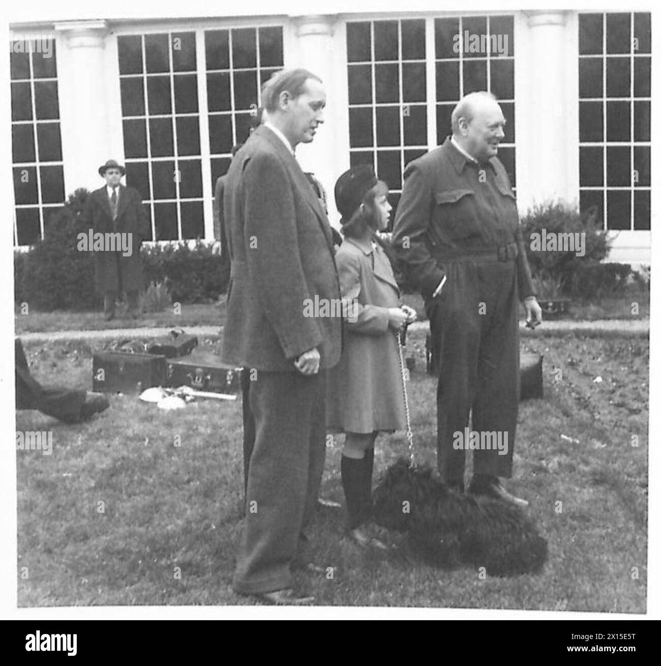 The Prime Minister poses for photographs with Mr. Harry Hopkins, Miss ...