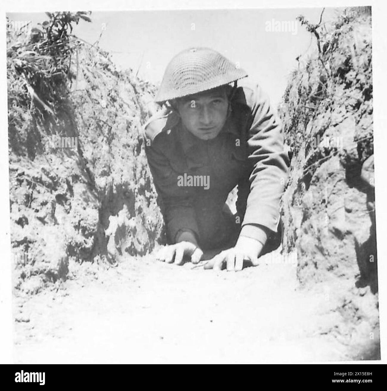 Lance Corporal Proctor moves up the crawl trench at the Anzio ...