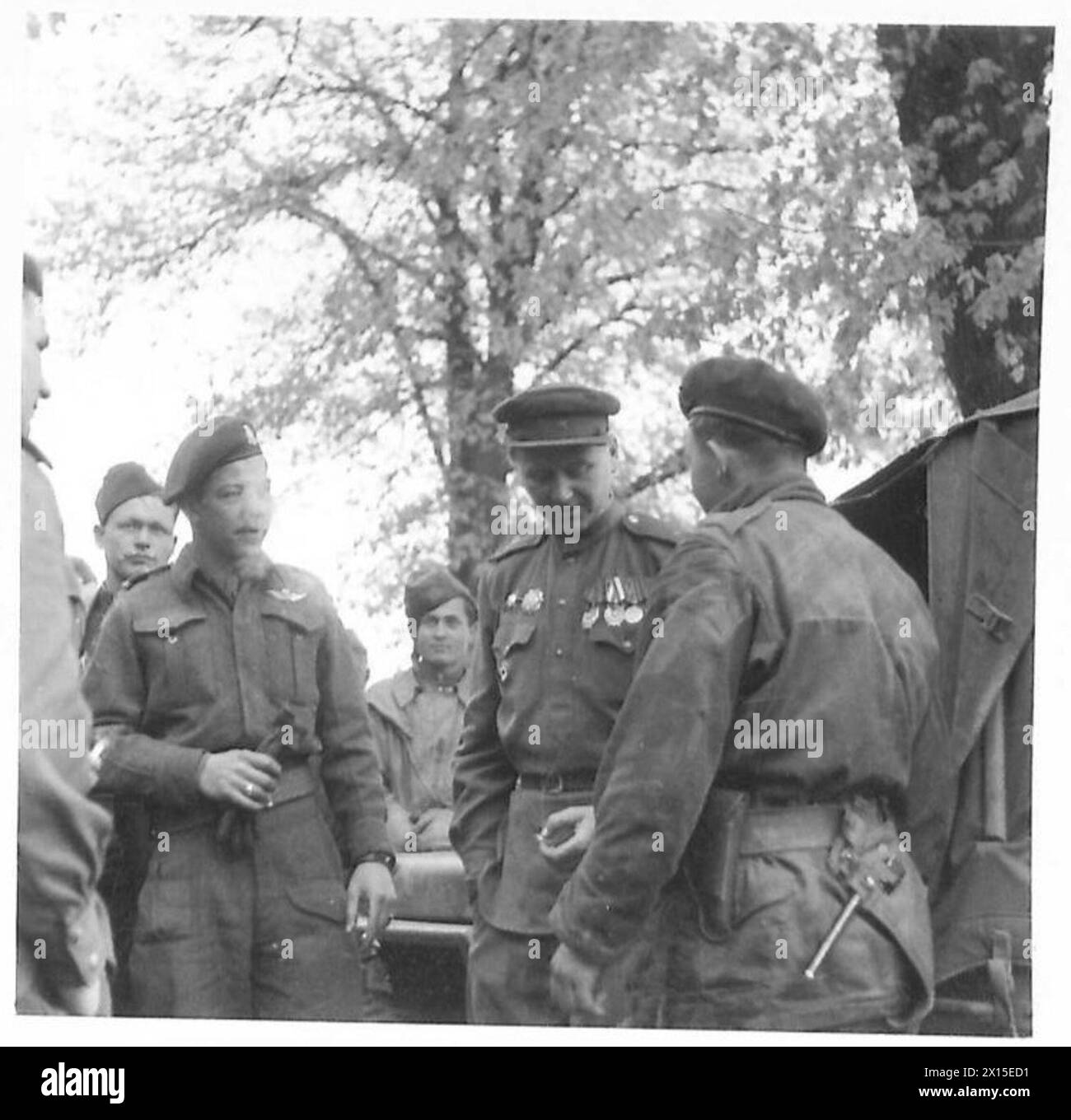 British, Russian, and Canadian soldiers meet after a boundary ...