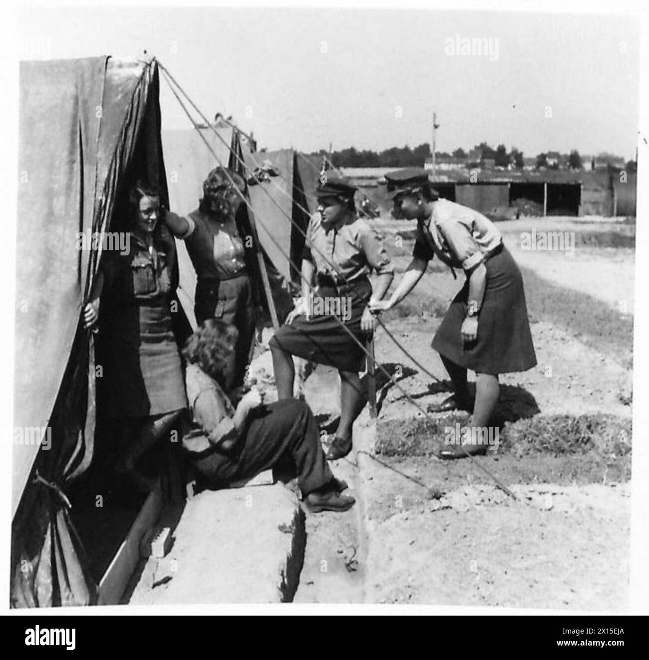 Hanging out washing Black and White Stock Photos & Images - Alamy