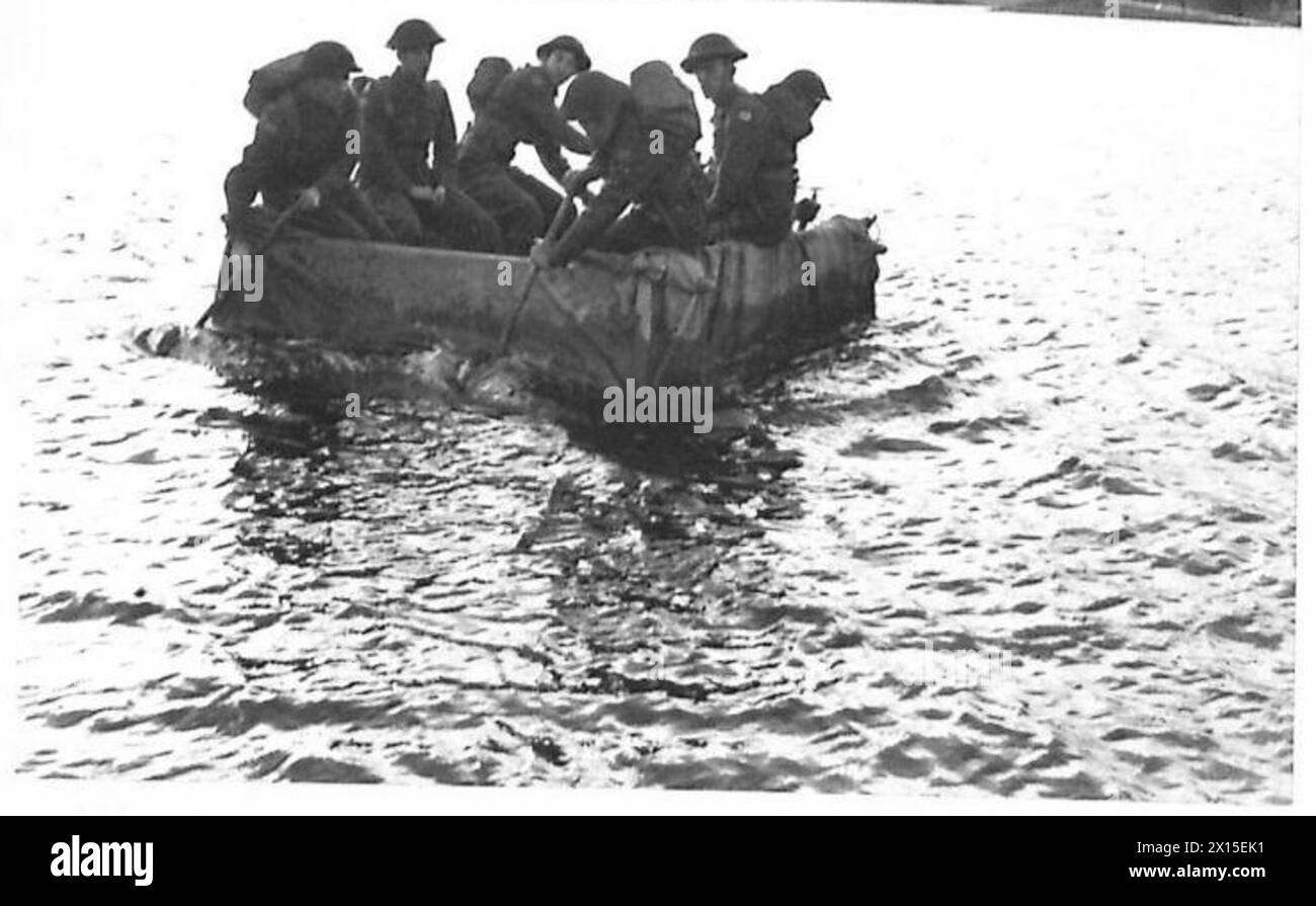 A FIELD AMBULANCE UNIT IN BATTLE TRAINING - An improvised boat is made ...