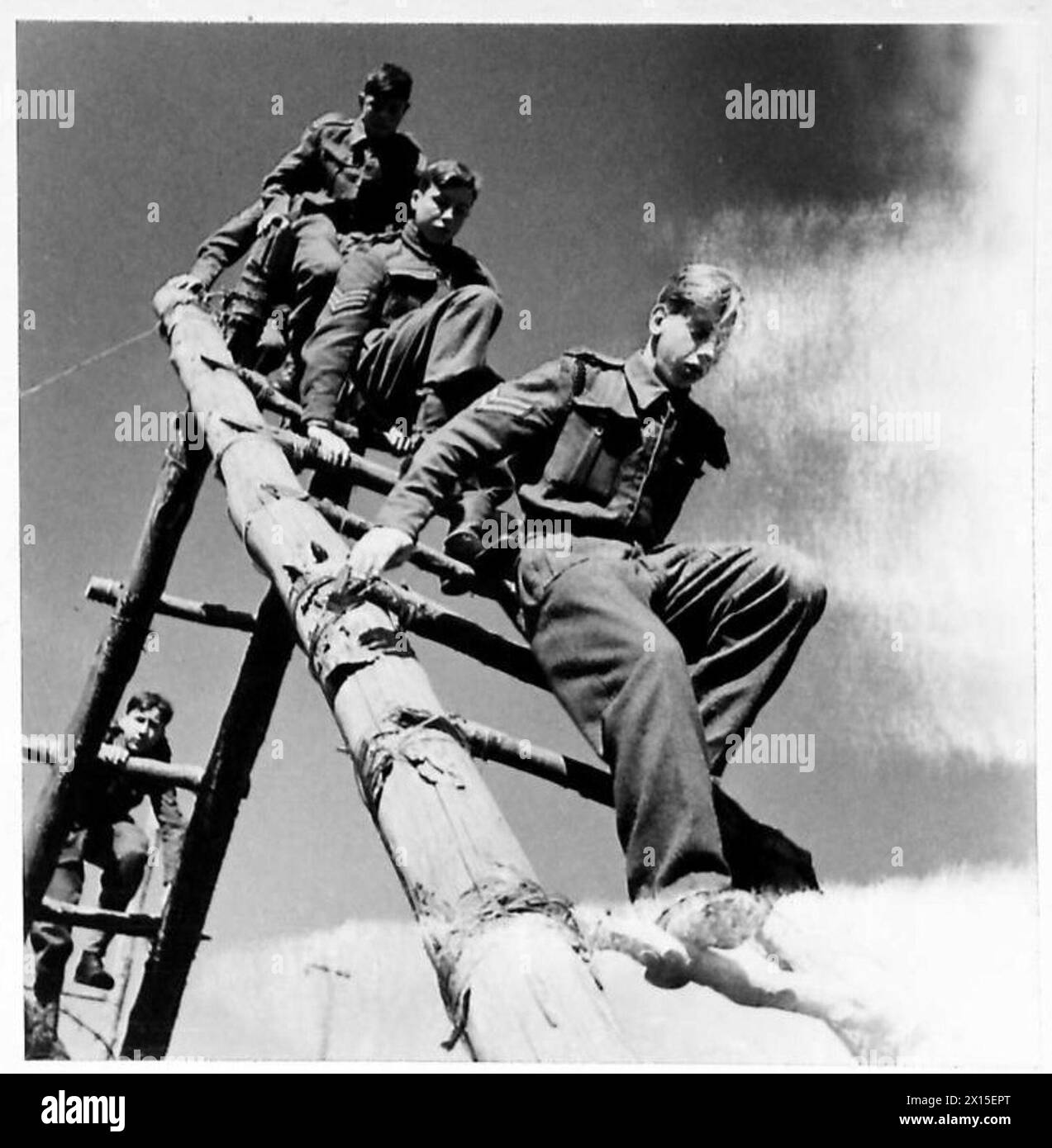 YOUNG SOLDIERS IN TRAINING - One of the obstacles is scaling an ...