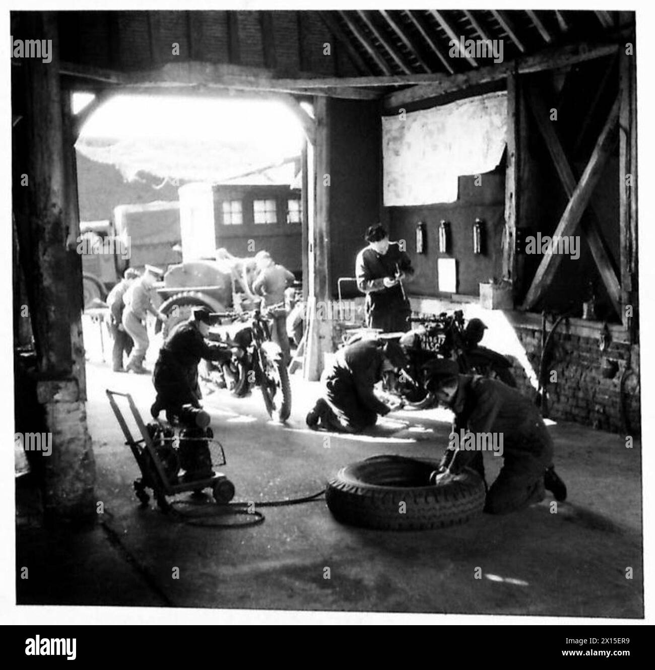 British Army personnel performing maintenance and assembly work in ...