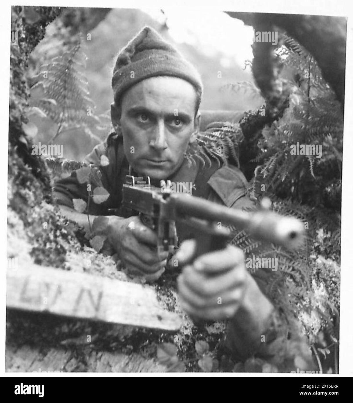 FRENCH COMMANDO SOLDIERS TRAIN AT A COMMANDO DEPOT - Close-up studies ...