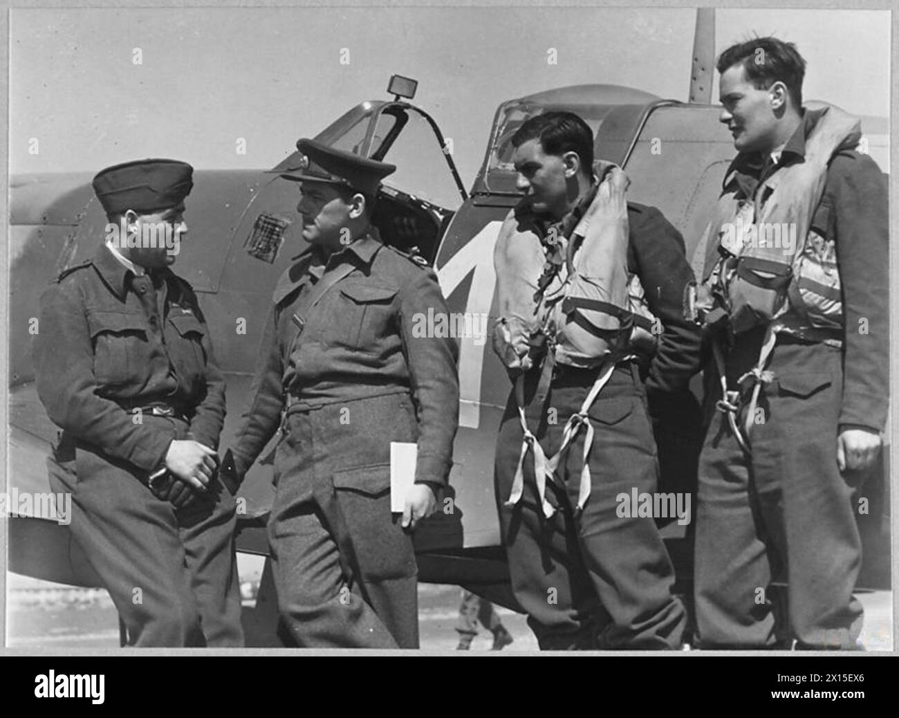 Soviet war correspondent M. Bondarenko wears British battledress while ...
