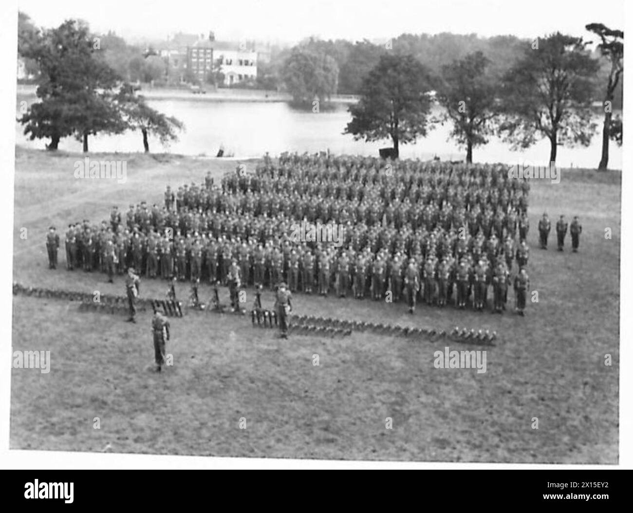 A battalion of the Scots Guards is shown on parade in fighting order ...