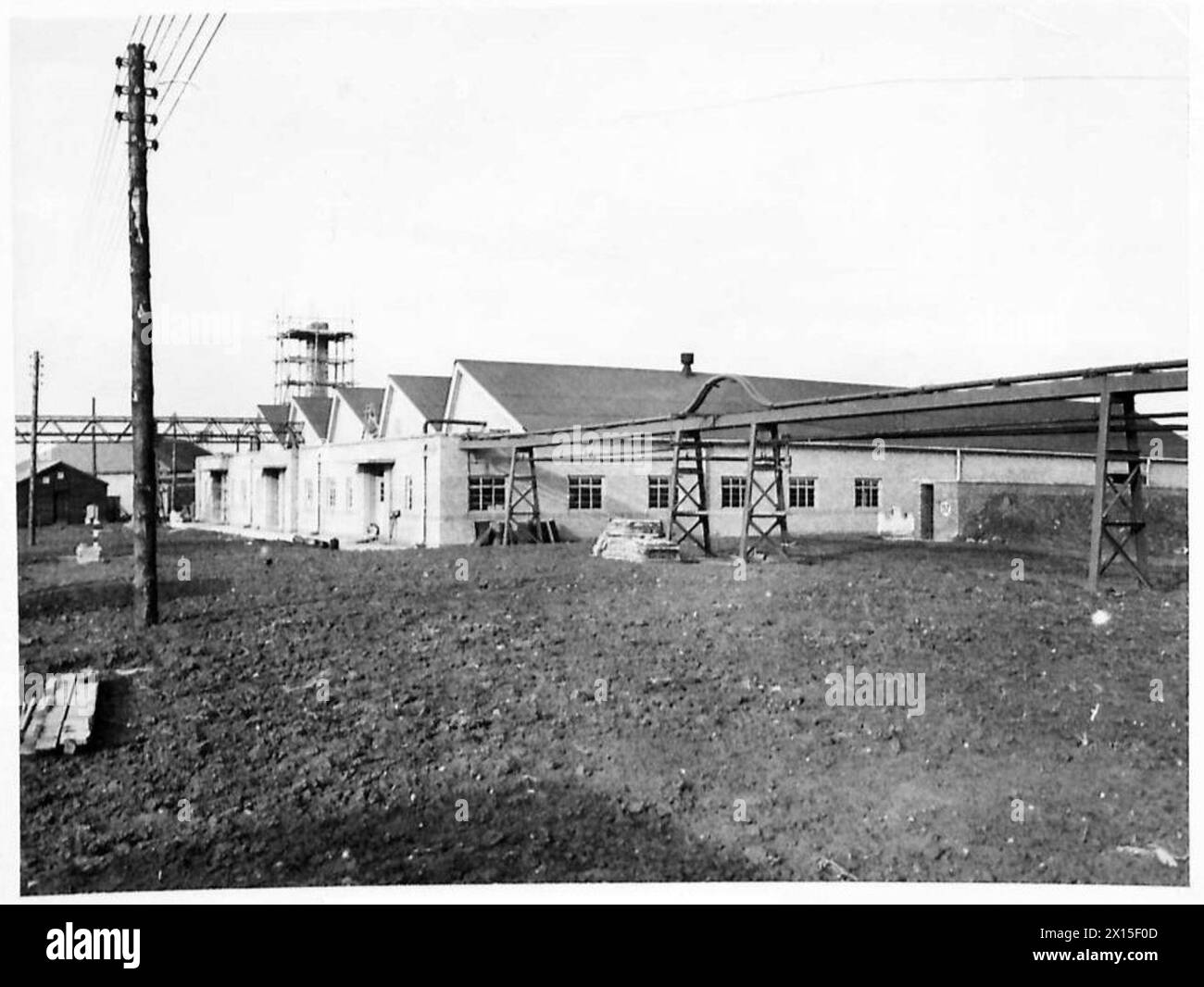 Photographs show the Central Ordnance Depot buildings at Donnington ...