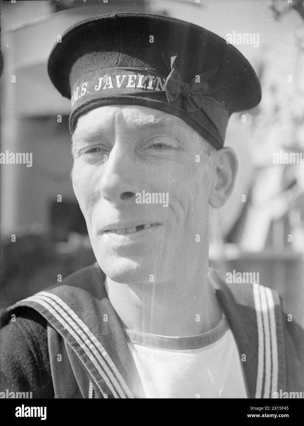 Crew members serving aboard the destroyer HMS Javelin in August 1940 ...