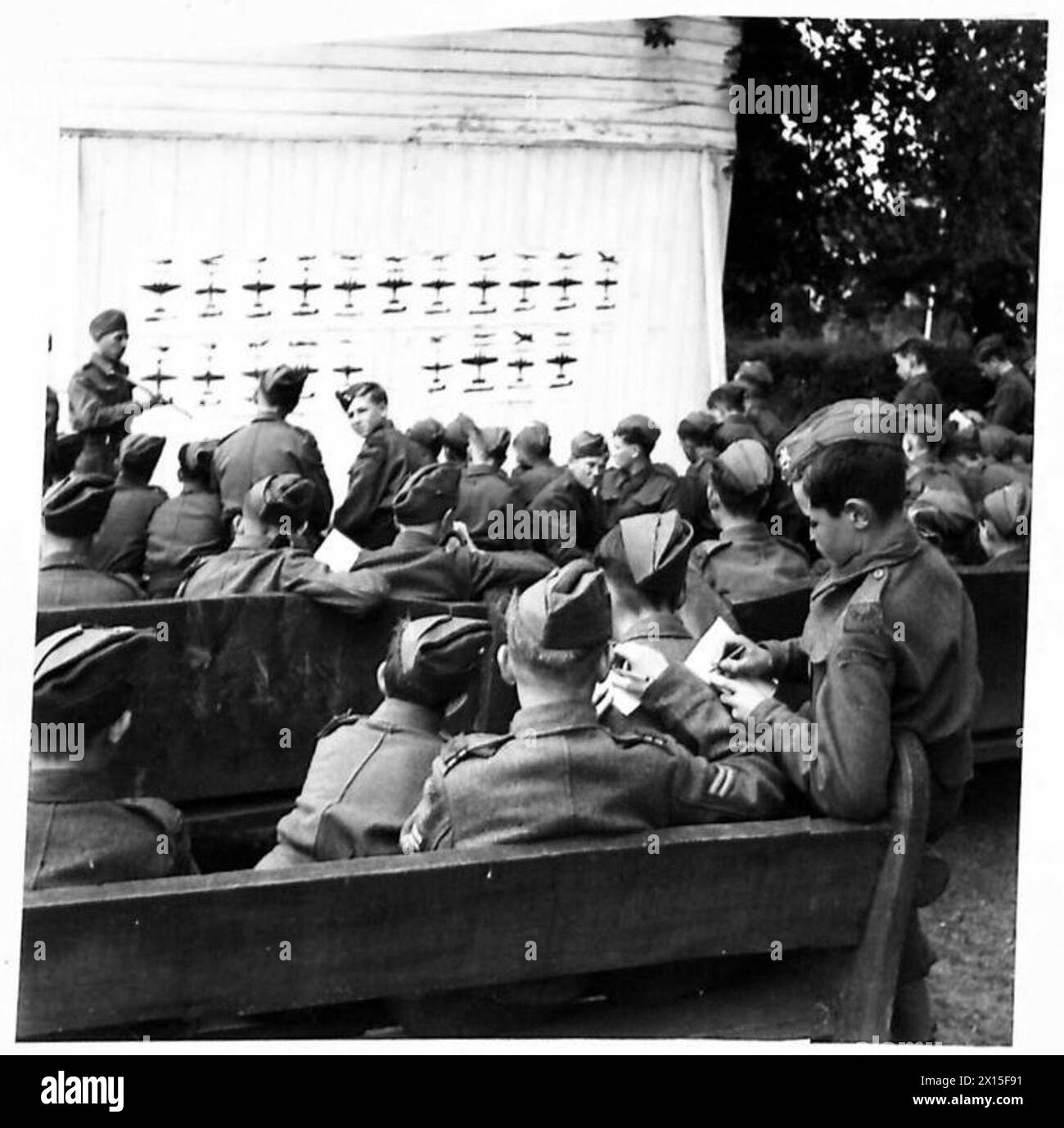Cadets at an Army Cadet Force camp receive instruction in aircraft ...