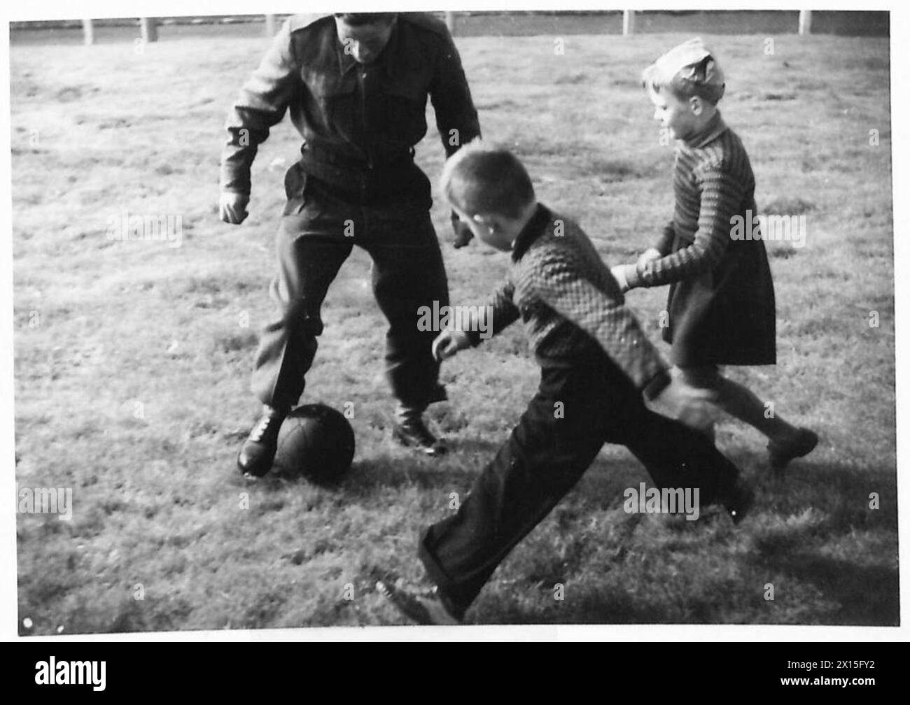 British army children playing hi-res stock photography and images - Alamy