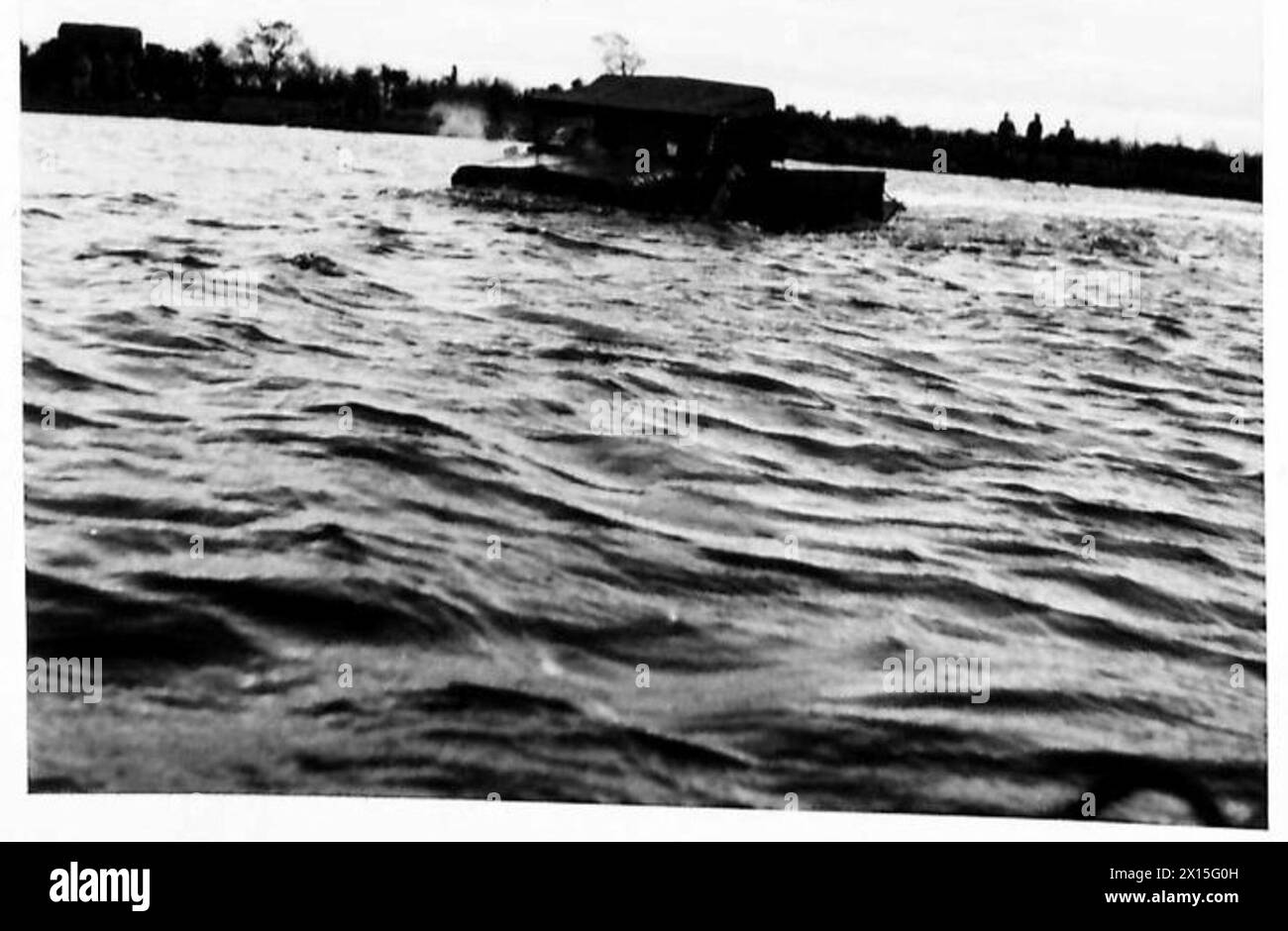 Army lorries drive through deep water during waterproofing tests to ...