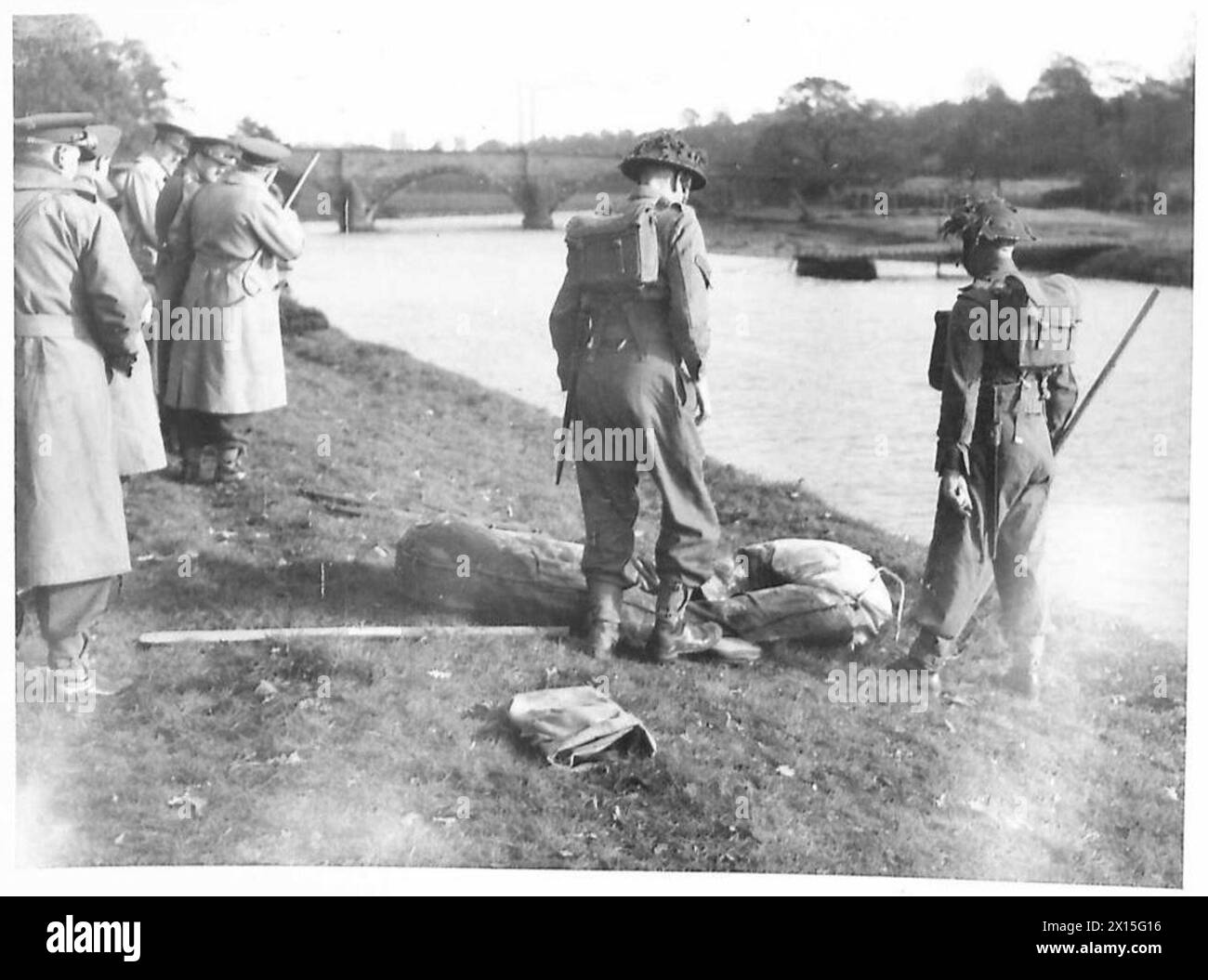 R.E. DEMONSTRATION - Sappers pumping up rubber boats in readiness for ...