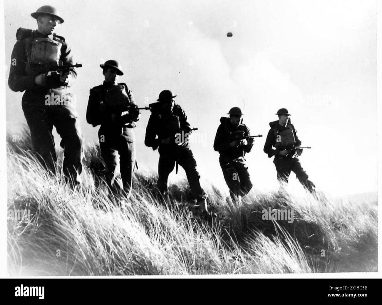 GRENADIER GUARDS REALISTIC TRAINING - A Tommy gun section is action ...