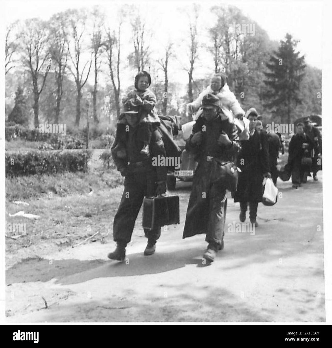 MASS SURRENDER OF GERMAN TROOPS - Two German soldiers walking to ...