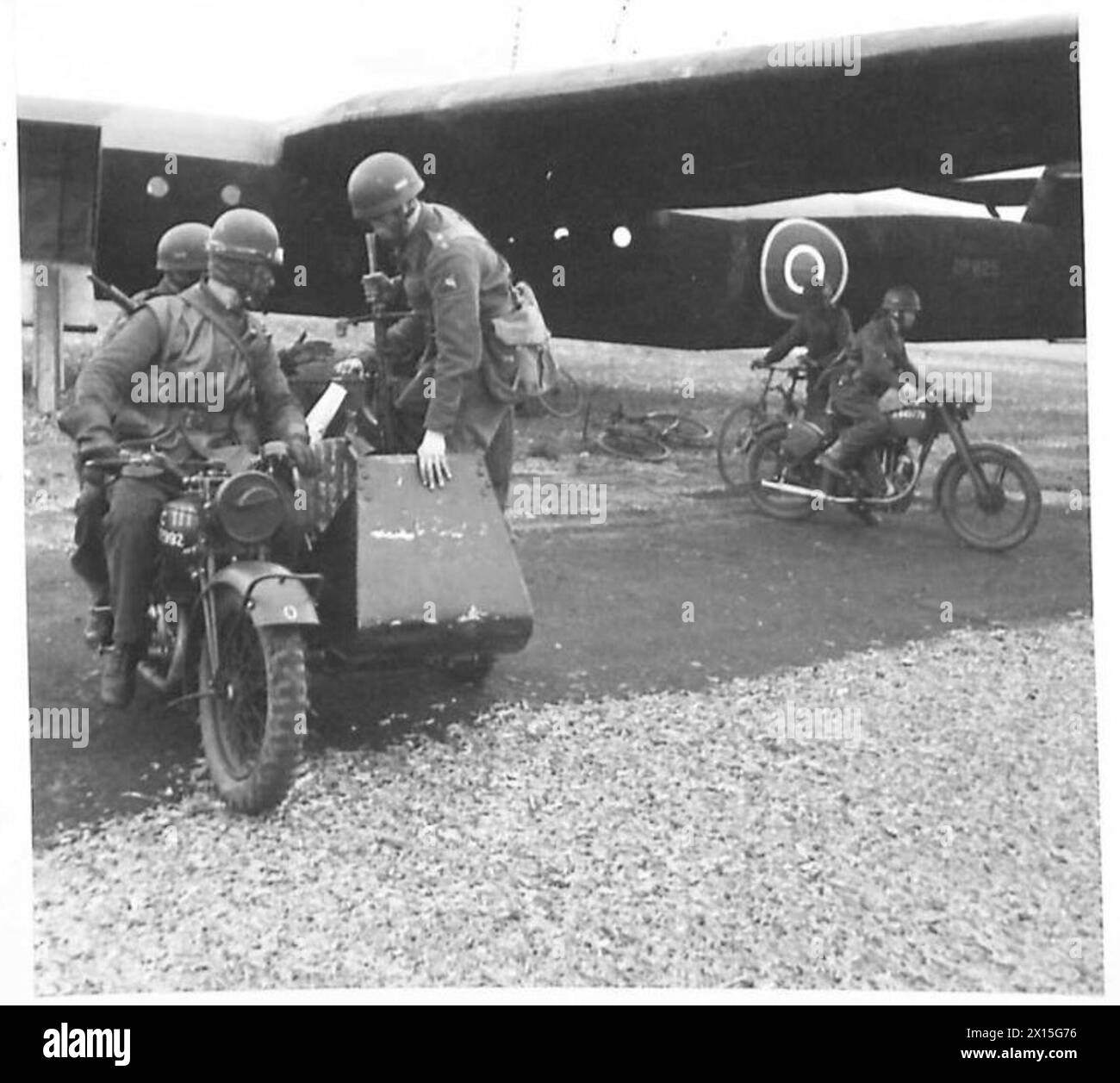 EQUIPMENT CARRIED BY GLIDERS - Glider troops unload motor cycles and ...
