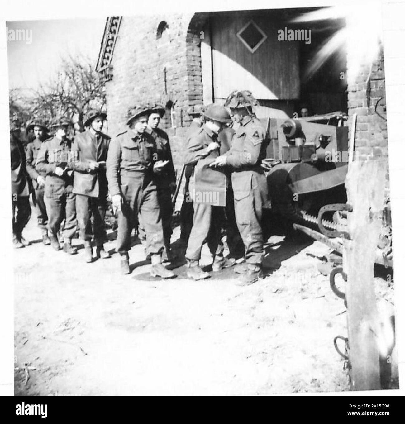 BRITISH COUNTER PATROL - The men hand in letters, pay books and ...