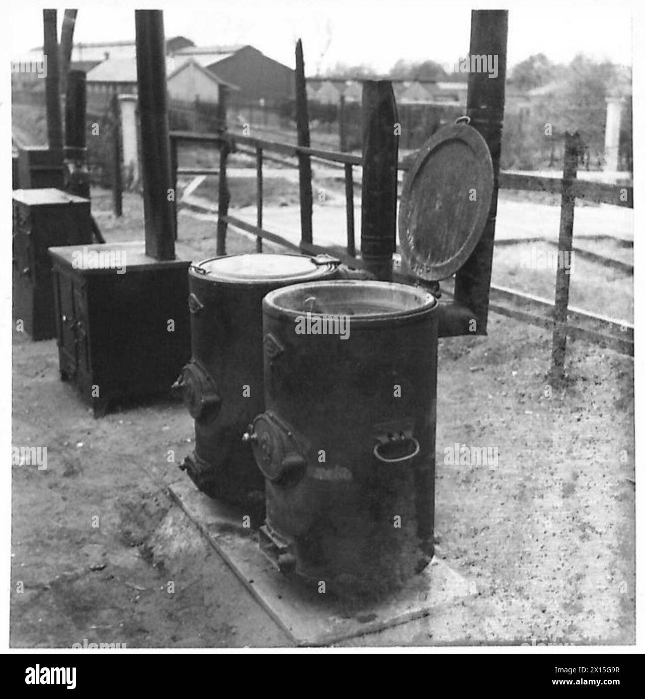 Improvised cooking ovens and boilers are in use at the Depot for food ...