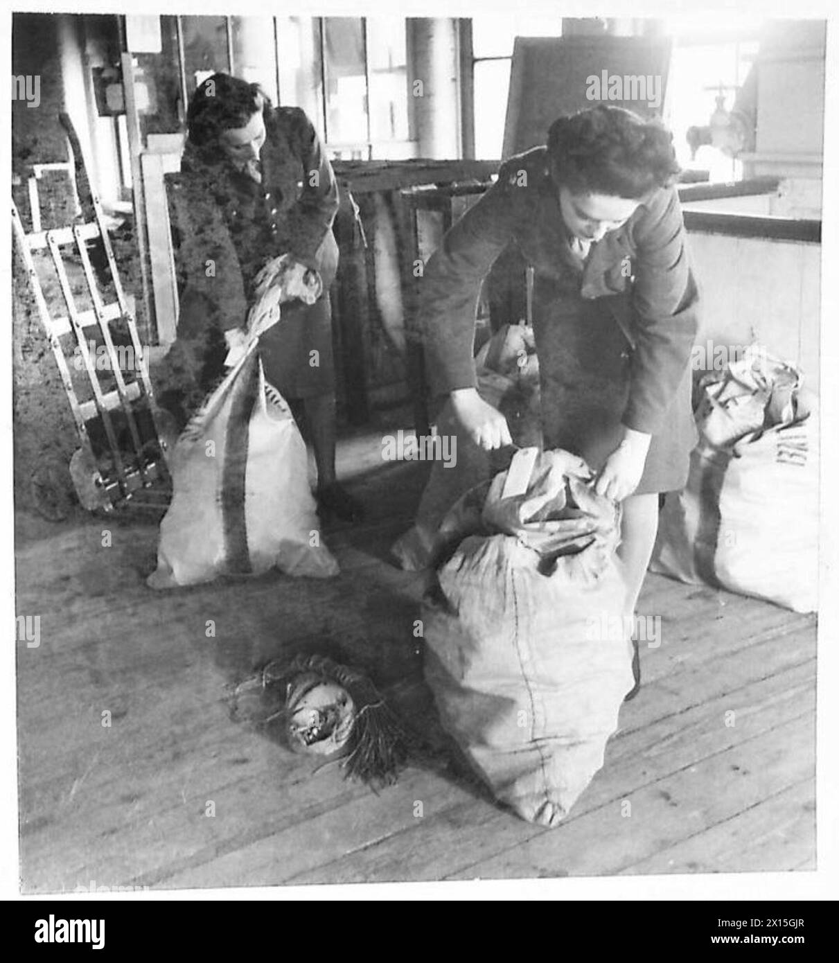ATS personnel are working at an Army Post Office handling mail and ...