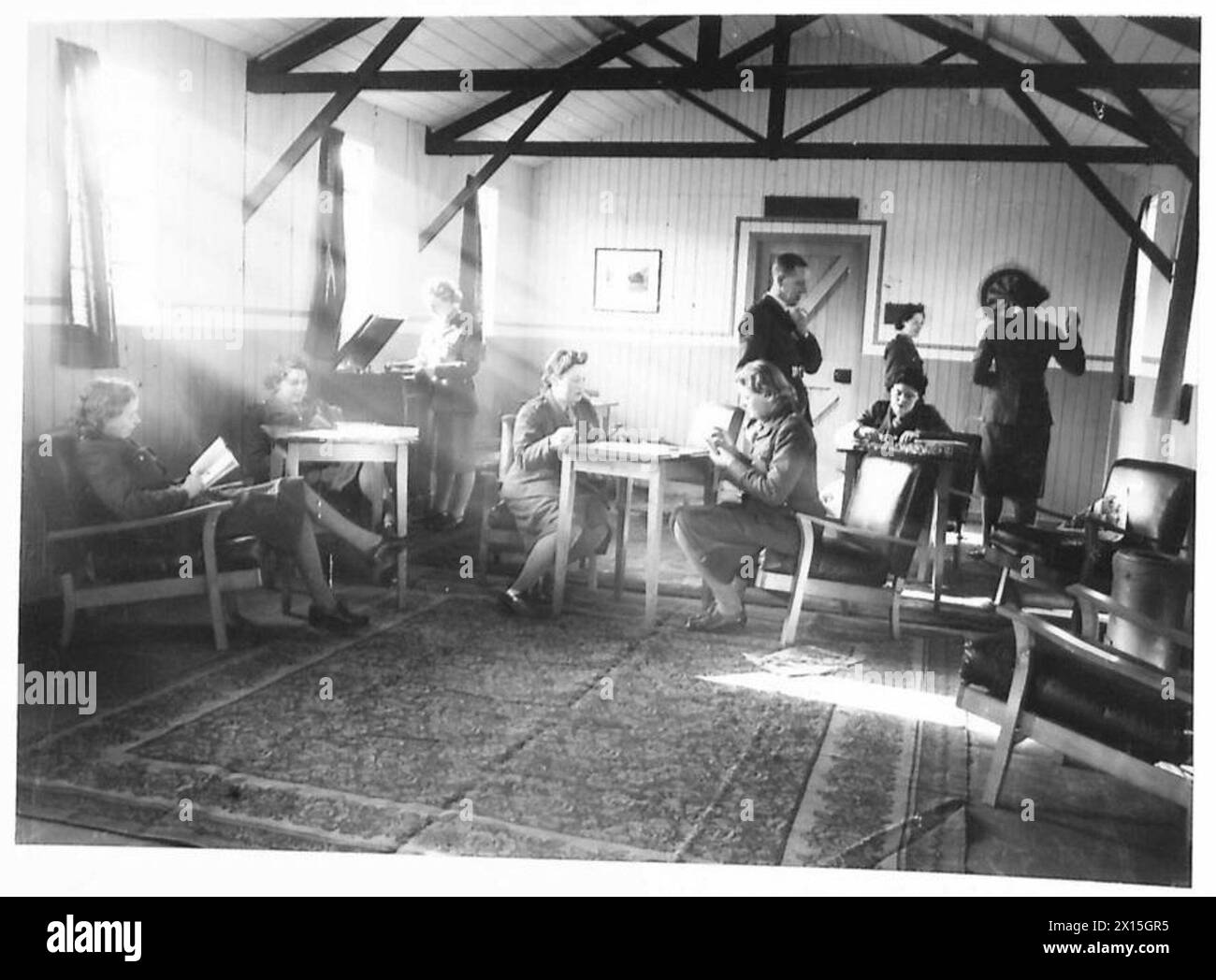 UGANDA HUTS - ATS enjoying refreshments in one of the huts during a ...