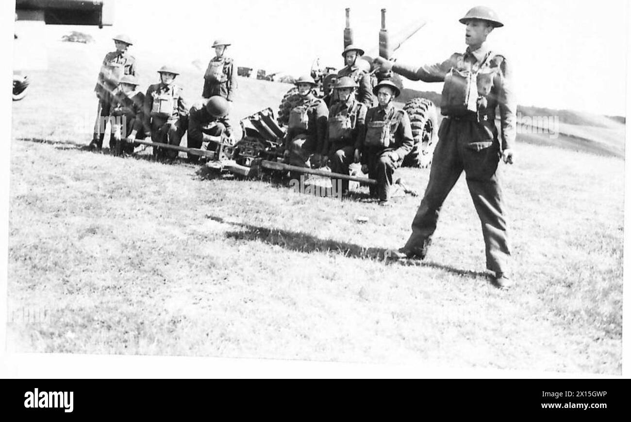 GUN HOWITZERS IN ACTION - The lorry being backed preparatory to ...
