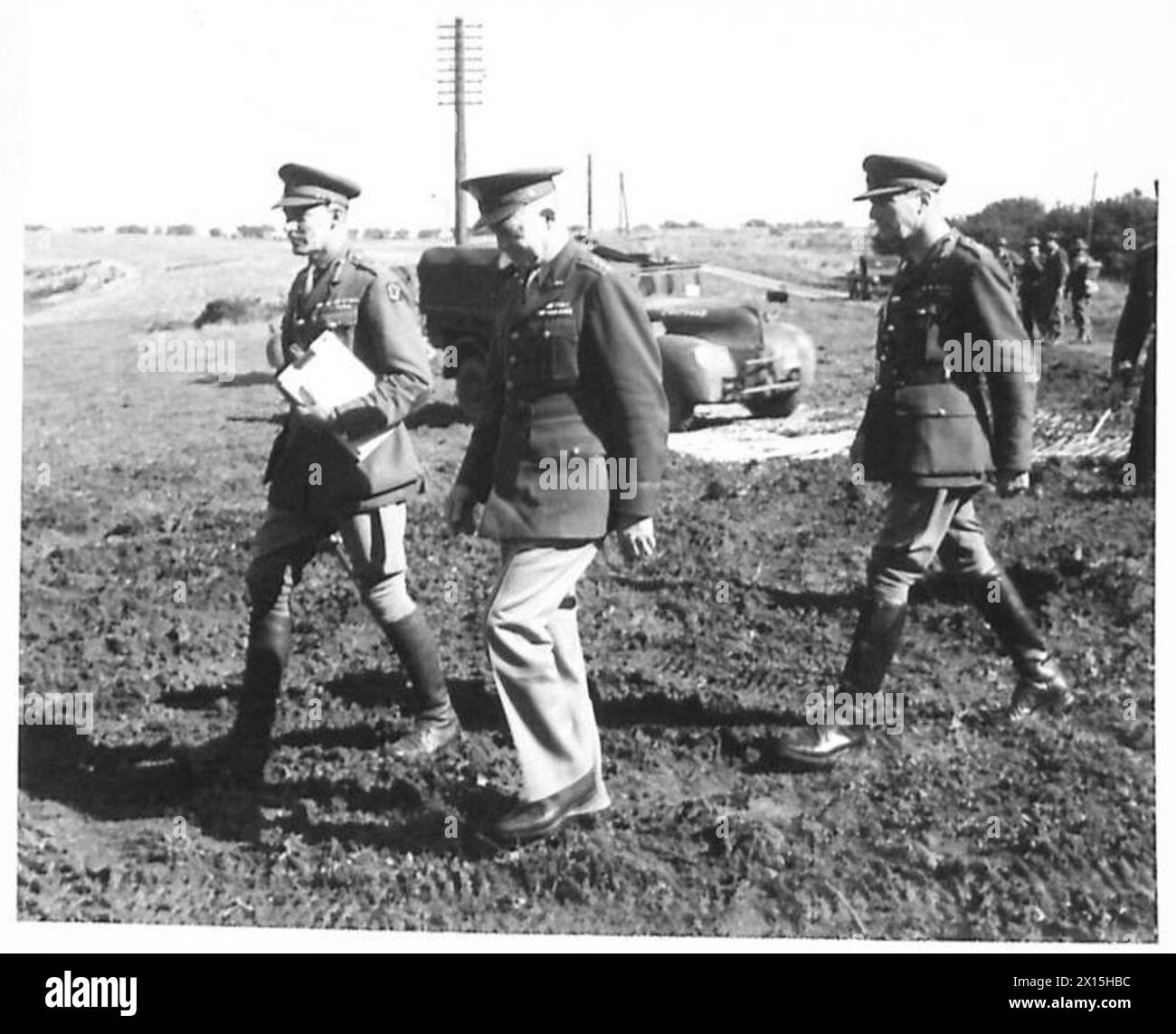 GENERAL EISENHOWER ATTENDS DIVISIONAL DEMONSTRATION - Left to right ...