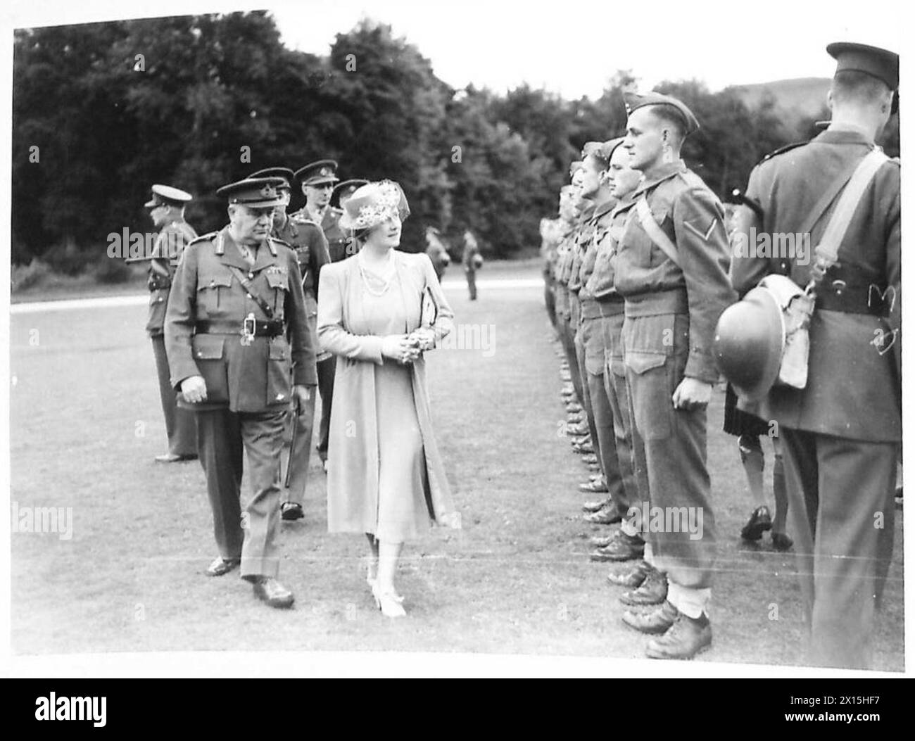 The King and Queen inspect members of the Canadian Forestry Corps ...