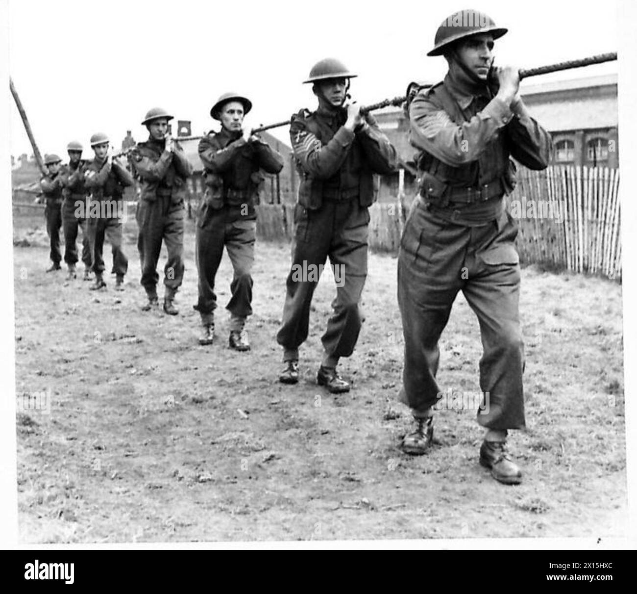 British Army personnel perform forward-pulling rope exercises as part ...