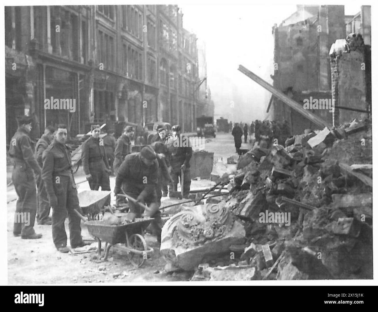 Men work on damaged Black and White Stock Photos & Images - Alamy