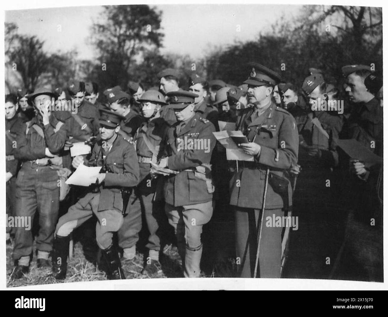 Photograph showing the Battalion Commander demonstrating an attack ...
