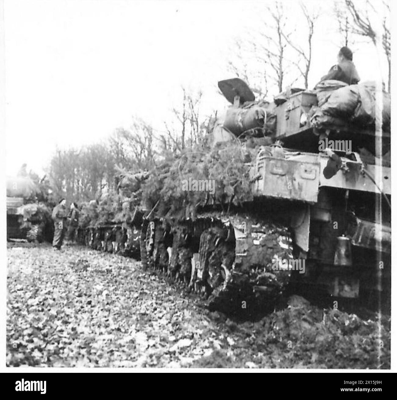 TANKS READY FOR BATTLE - Well-camouflaged tanks standing by for the ...