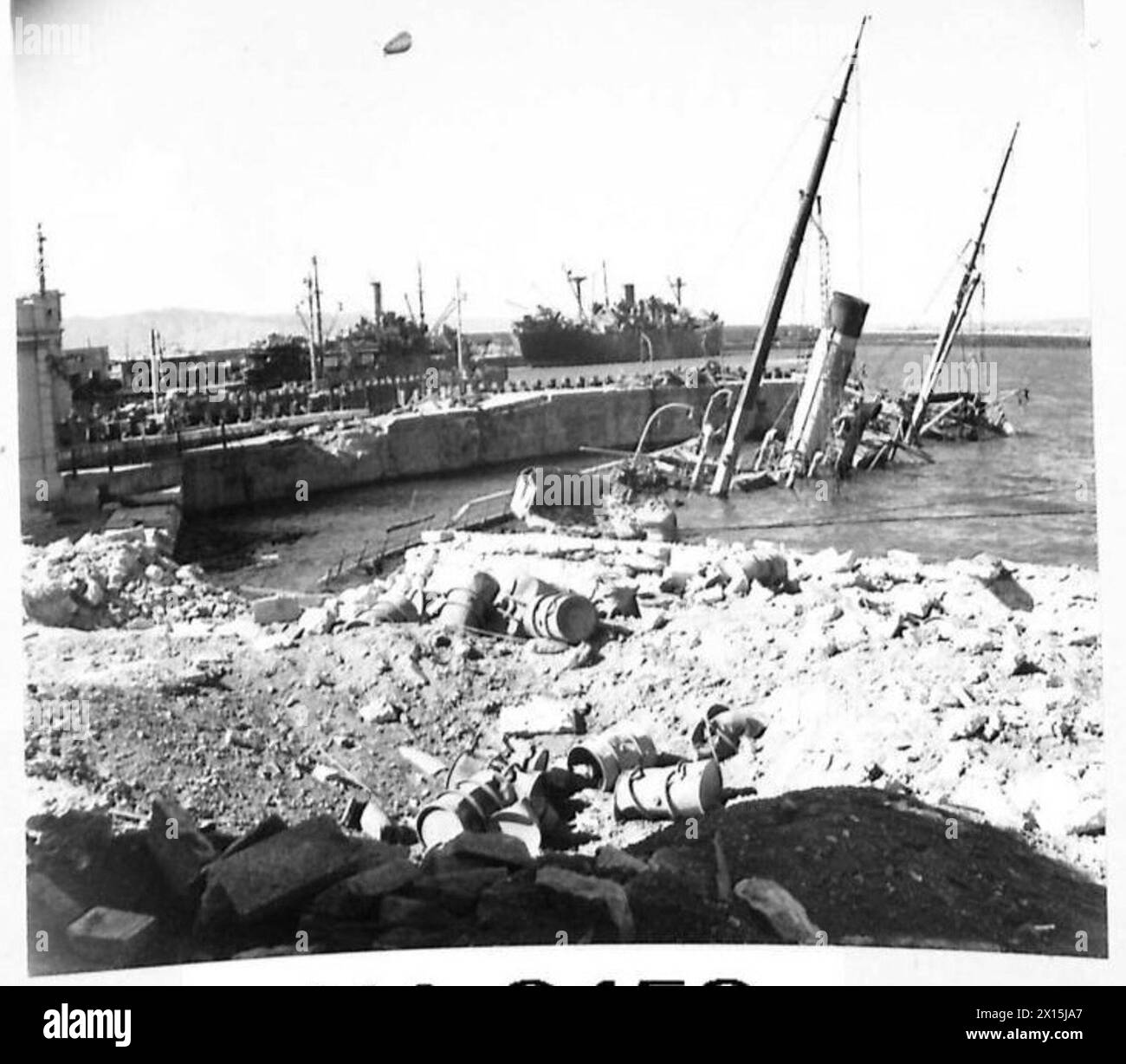 INVASION OF ITALY - View of the harbour at Reggio, in the foreground is ...