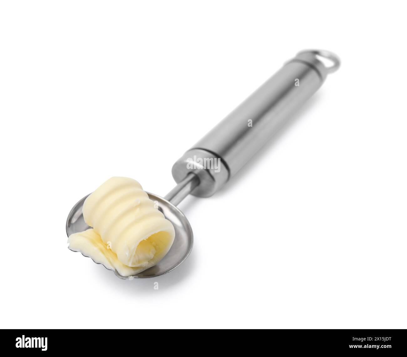 Butter curl in spoon isolated on white Stock Photo - Alamy
