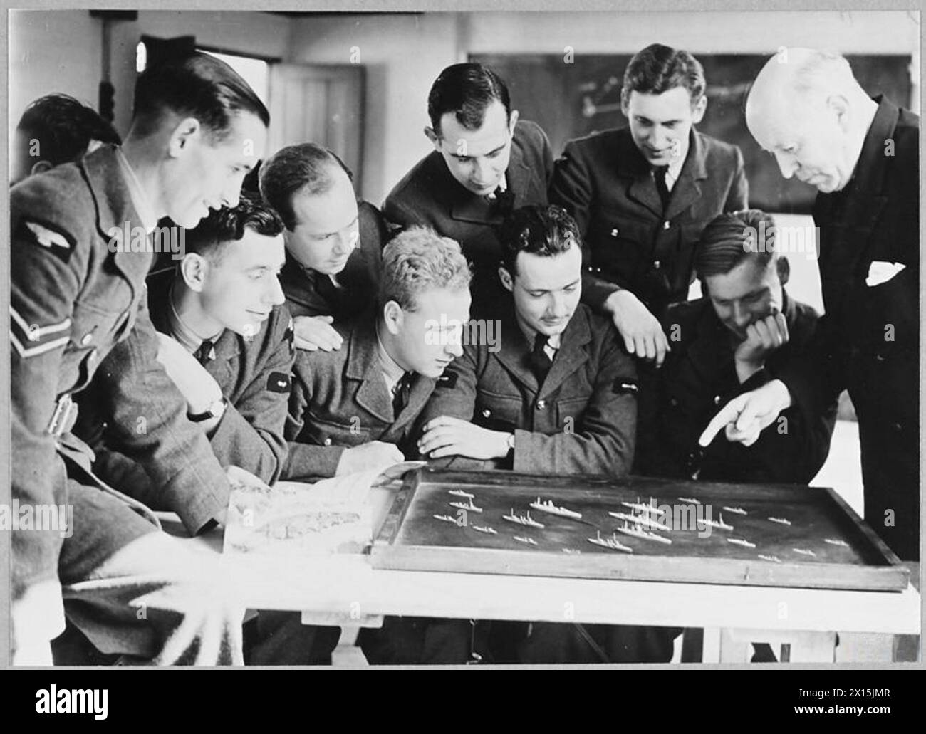 Air observers in training at an RAF Observer School learn navigation ...