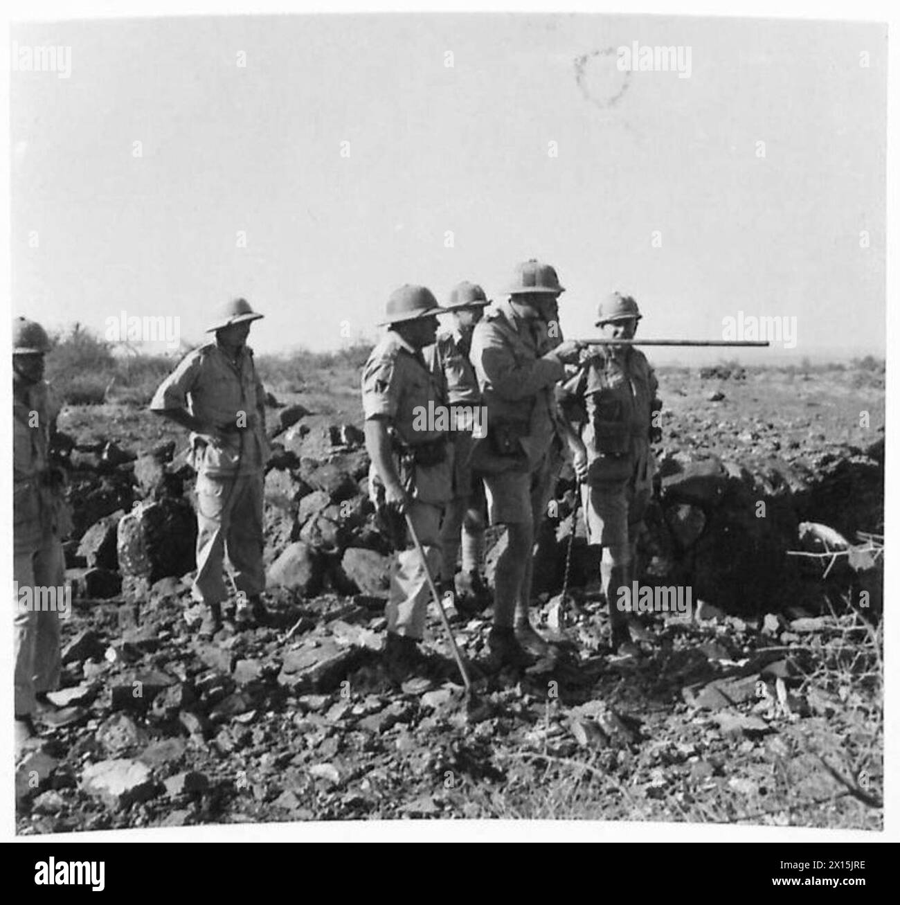 MAJOR-GENERAL G.E. BRINK, D.S.O. INSPECTS THE FORWARD POSITIONS ON THE ...